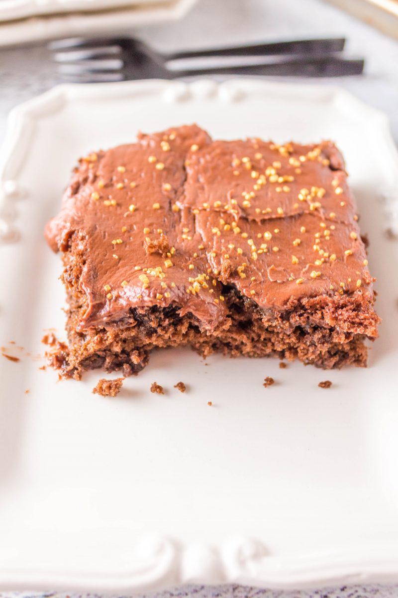 Moist Chocolate sheet pan poke cake - The Kitchen Bucket List