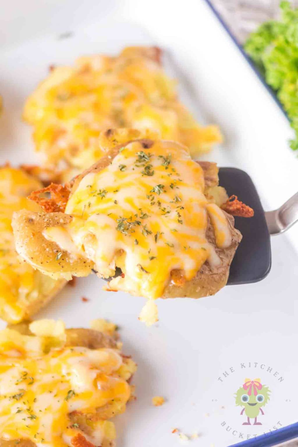 Smashed potatoes with cheese - The Kitchen Bucket List